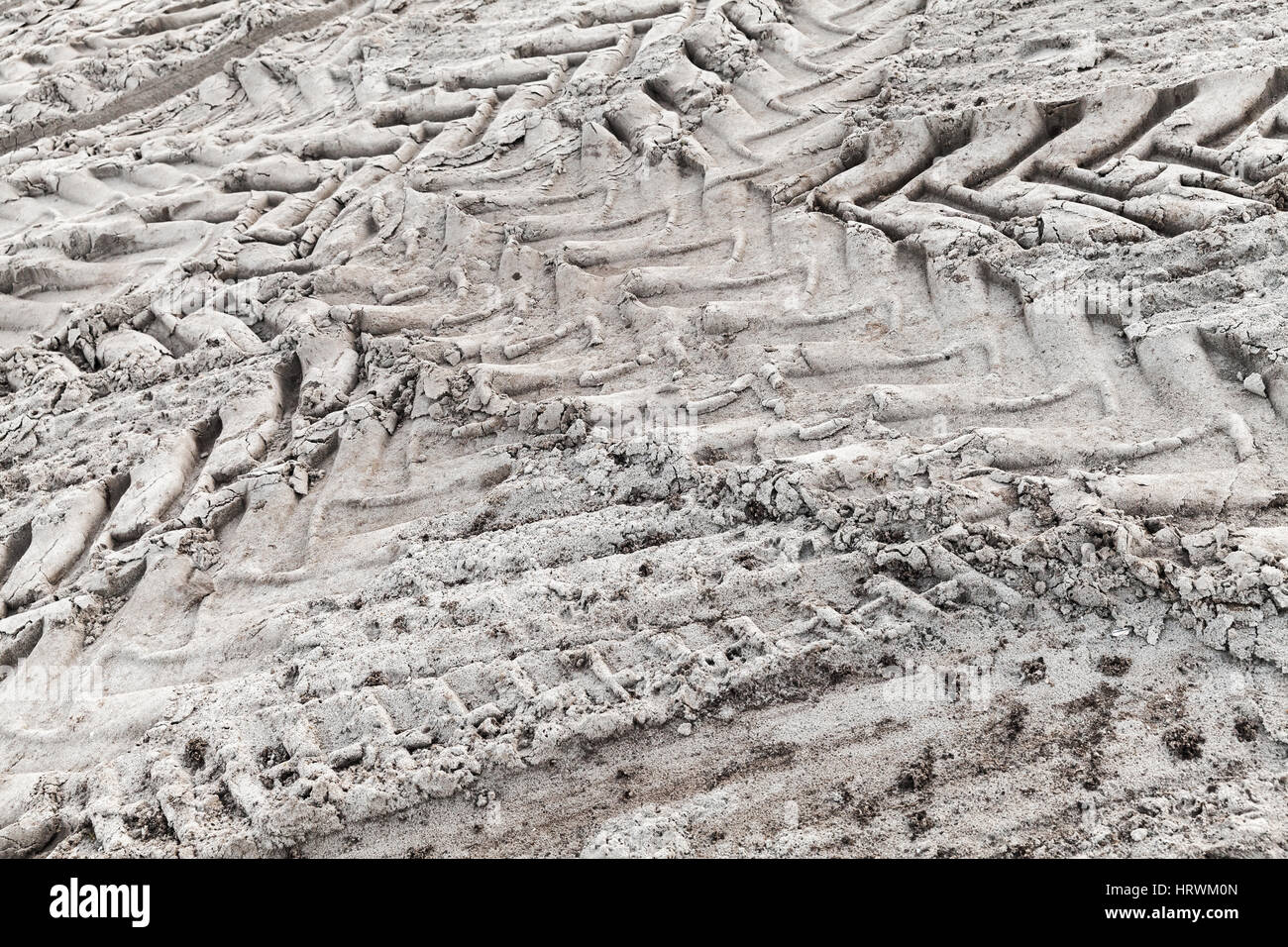 Tractor tire tracks pattern on gray ground, abstract transportation ...