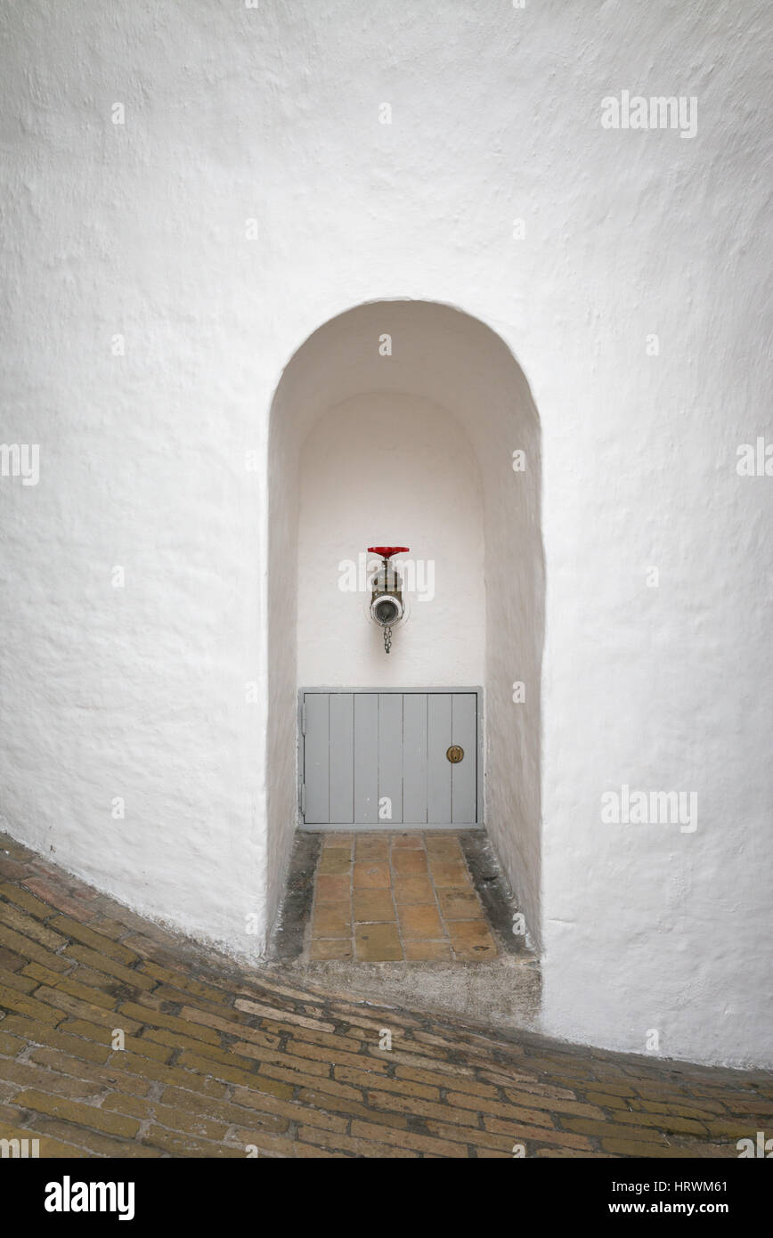 Alcove in central core of circular tower with fire hydrant, Copenhagen ...