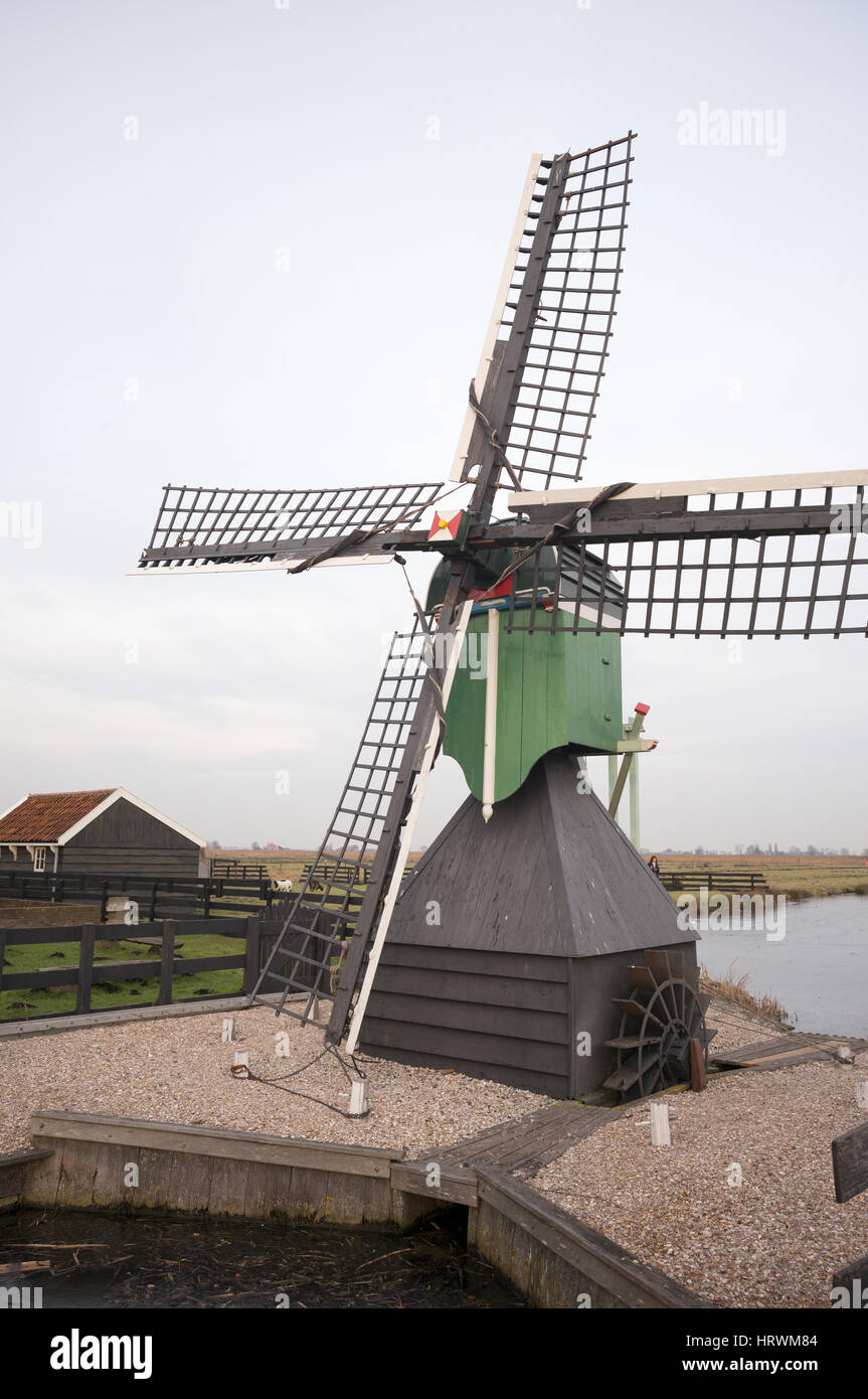 Reconstructed windmill with paddle wheel for moving water, Zaans, The ...