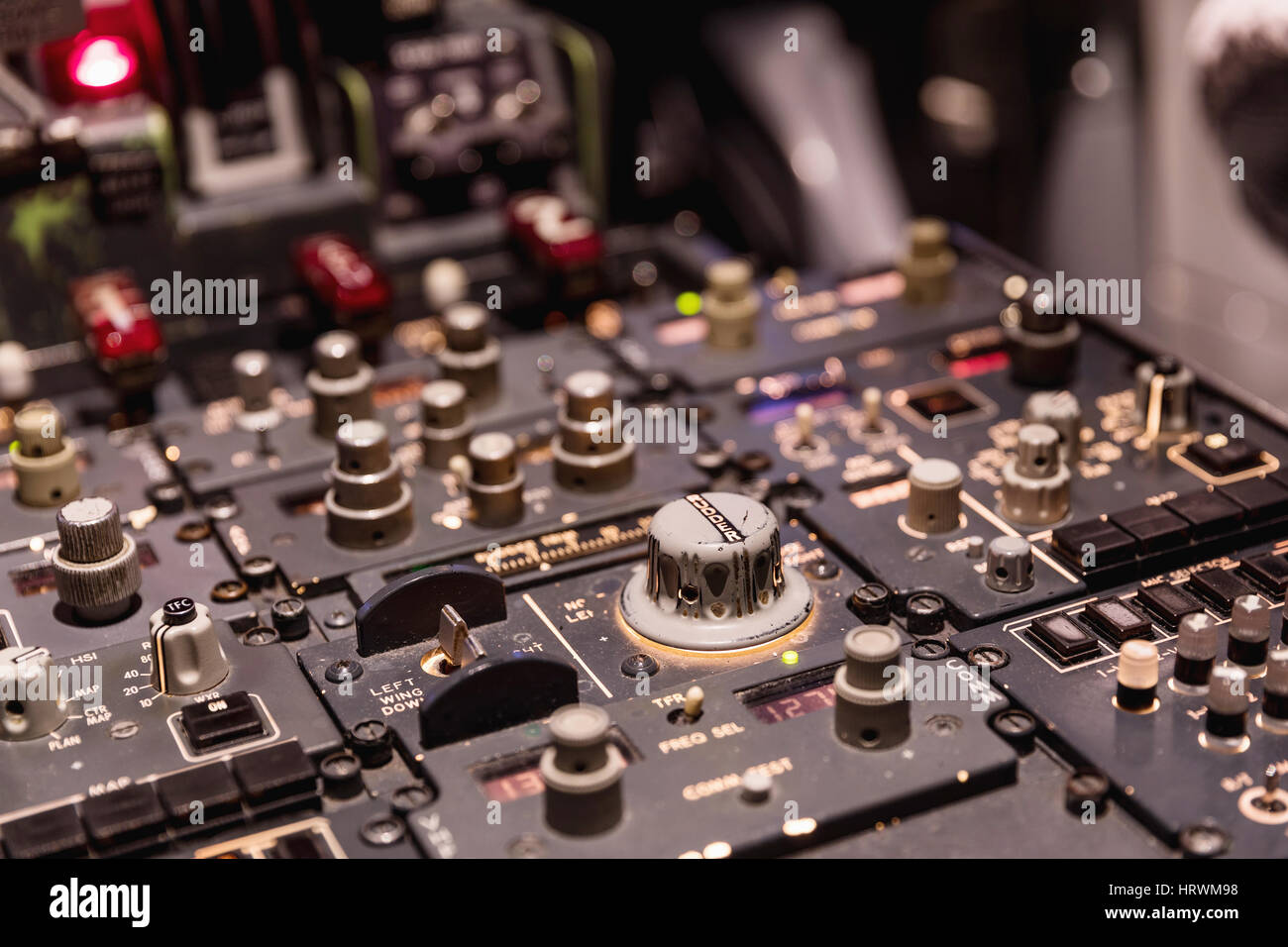Airplane cockpit view. View of the dashboard lit cockpit of a large ...