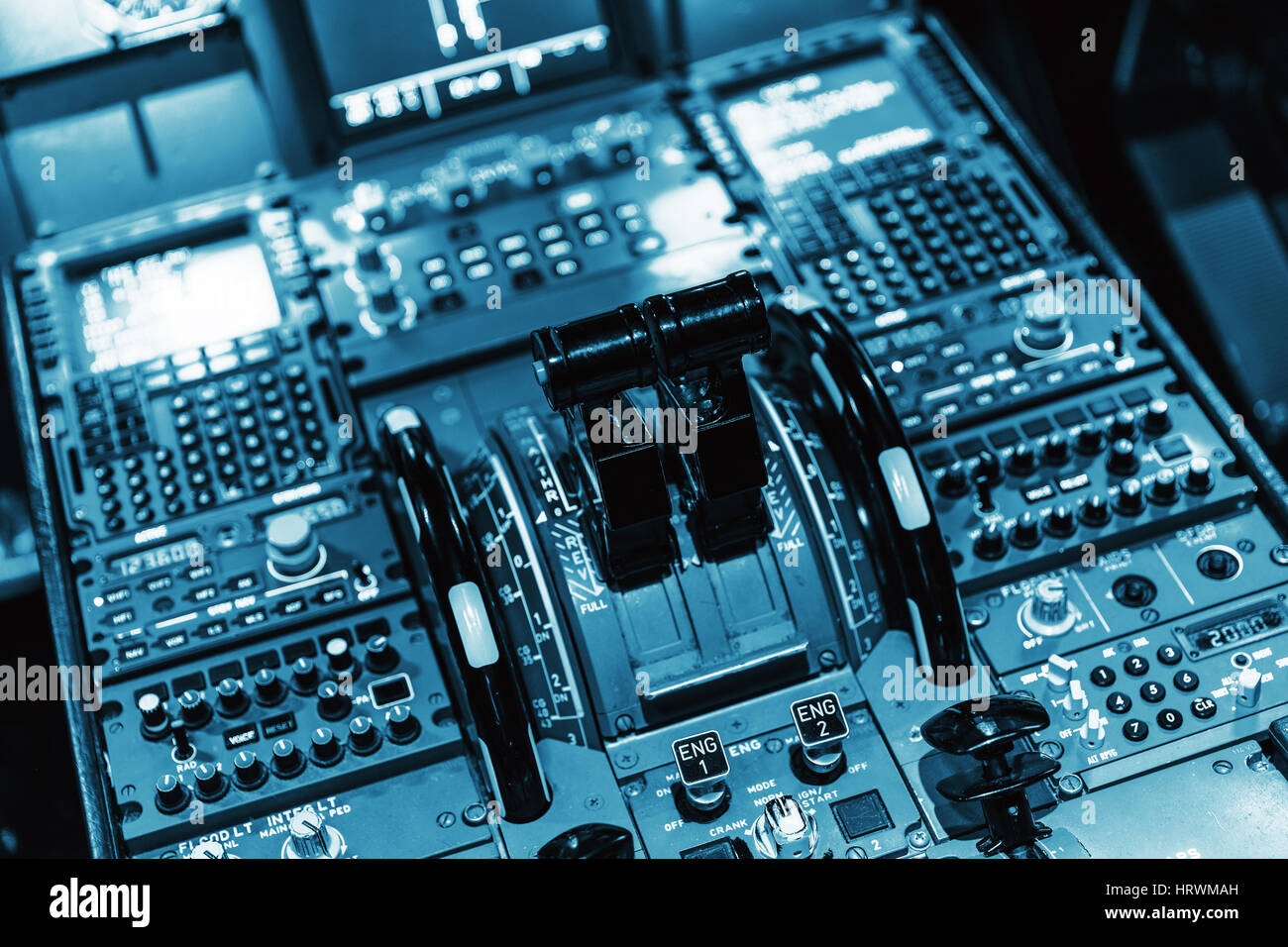 Engine lever in the cockpit of an airliner. Blue technical colored ...