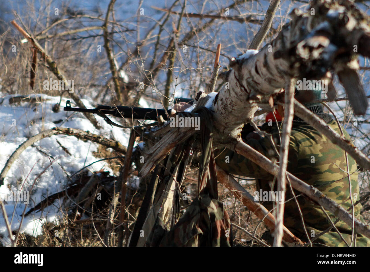 soldier or sniper holding gun with virtual screen projection and aiming ...