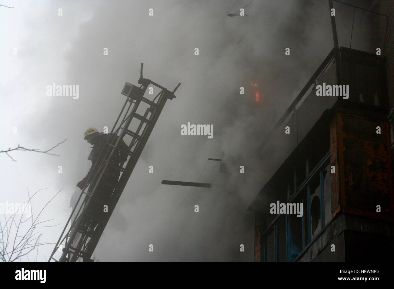 fireman wearing a gas mask on the stairs Stock Photo - Alamy