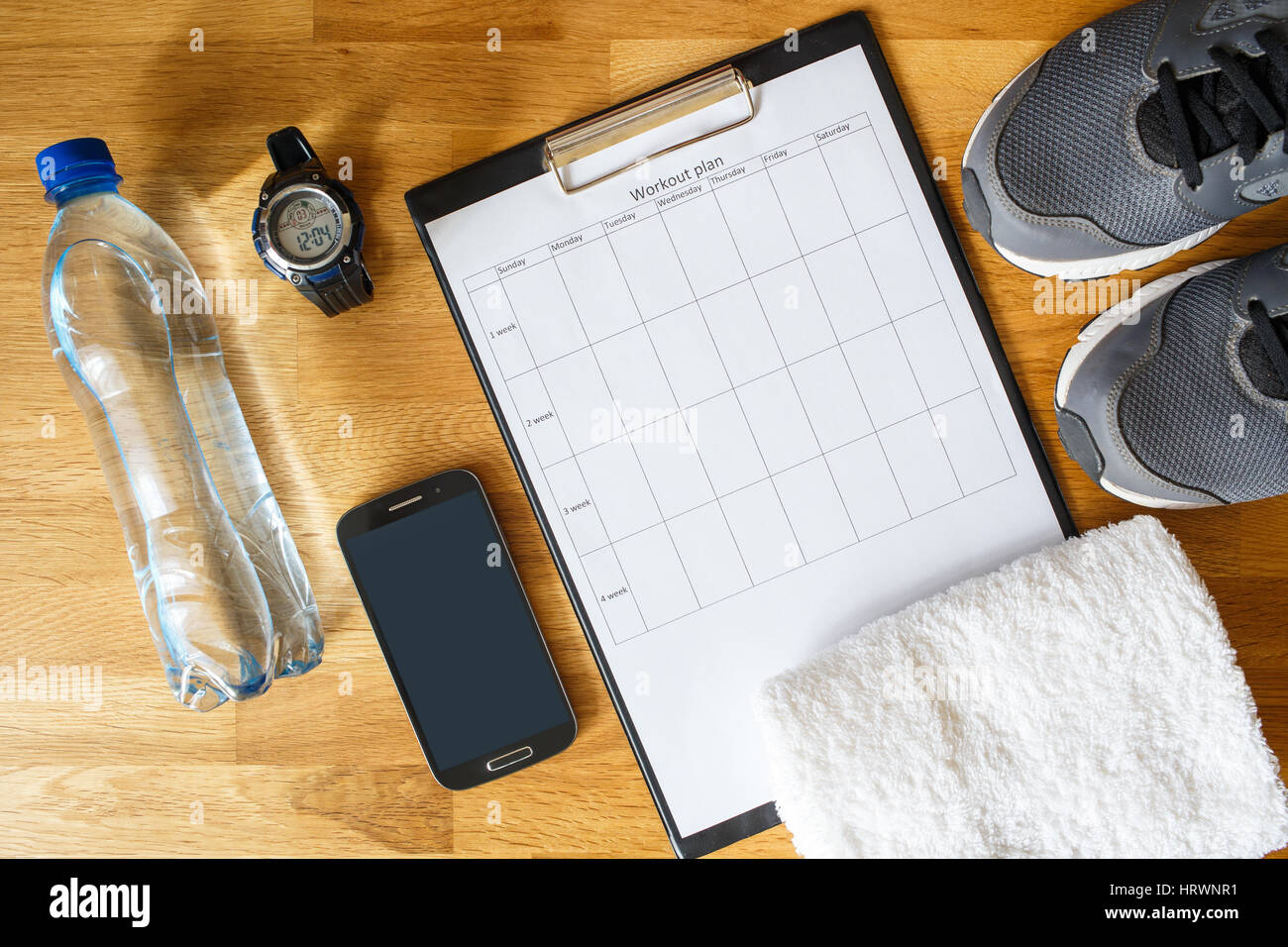 Personal workout plan with phone and other stuff Stock Photo - Alamy