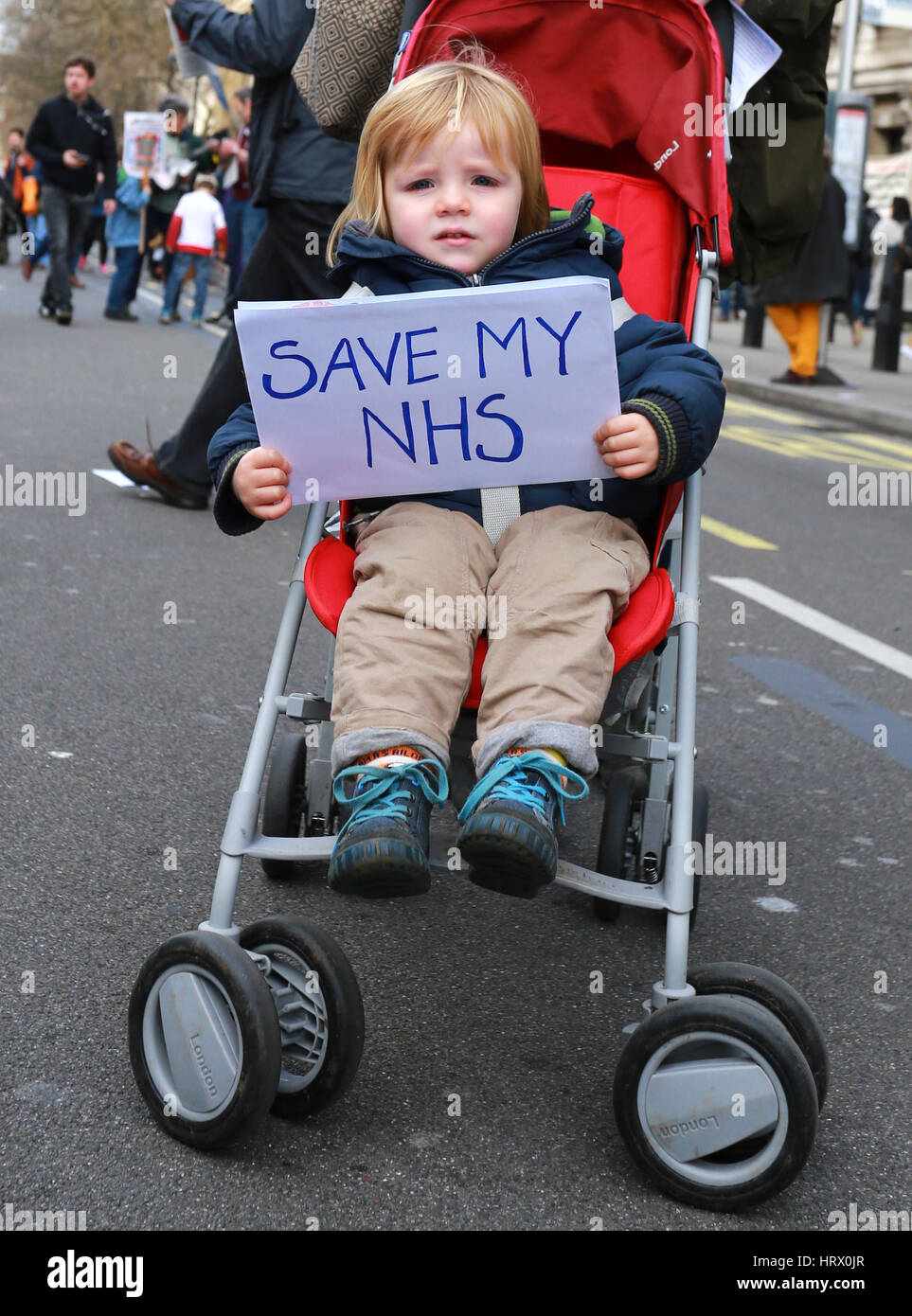 It's Our NHS - National demonstration . London, UK . 04.03.2017 A child ...