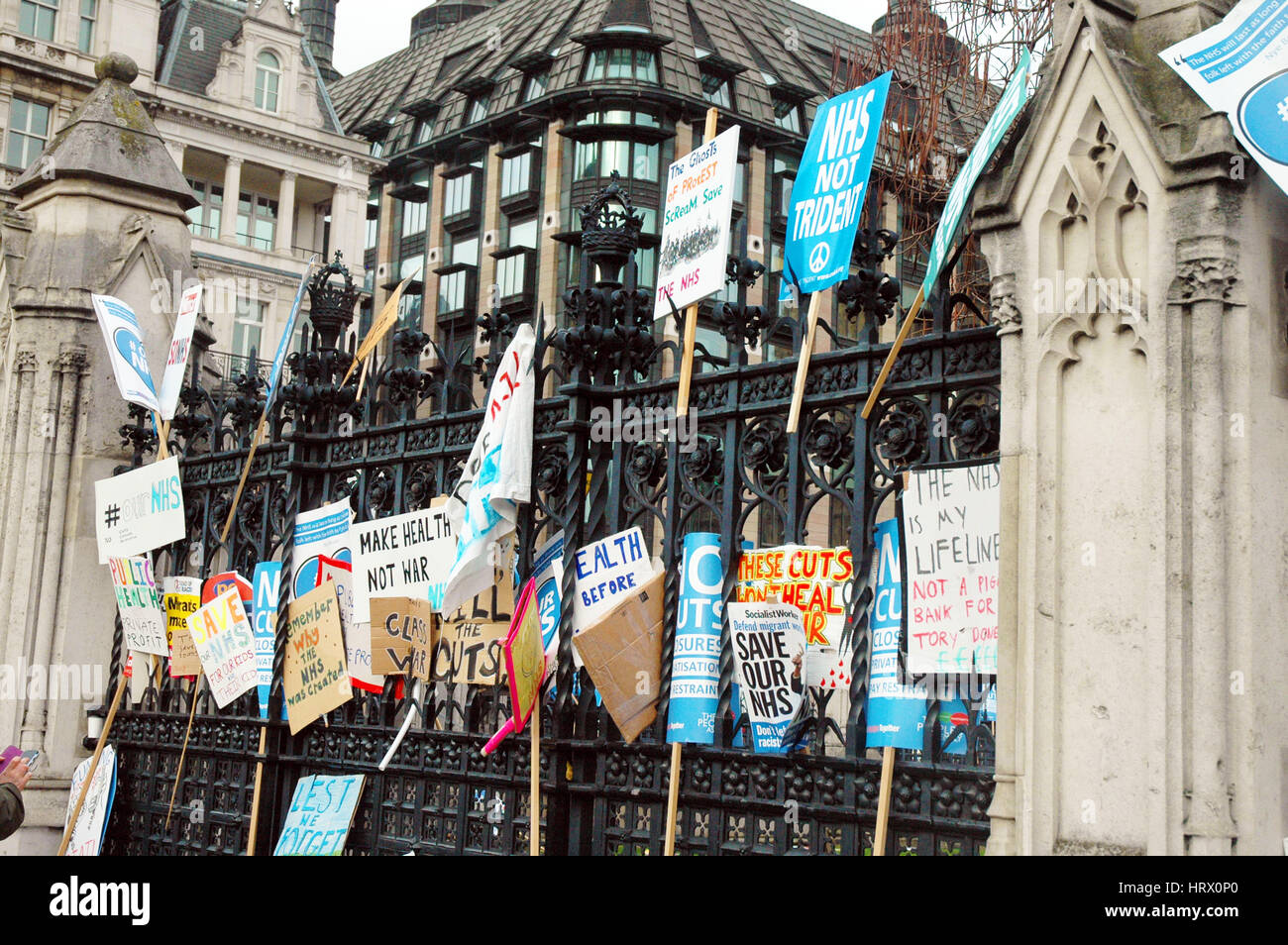 London, UK, 04/03/2017, Placards on the railings of the Houses of ...