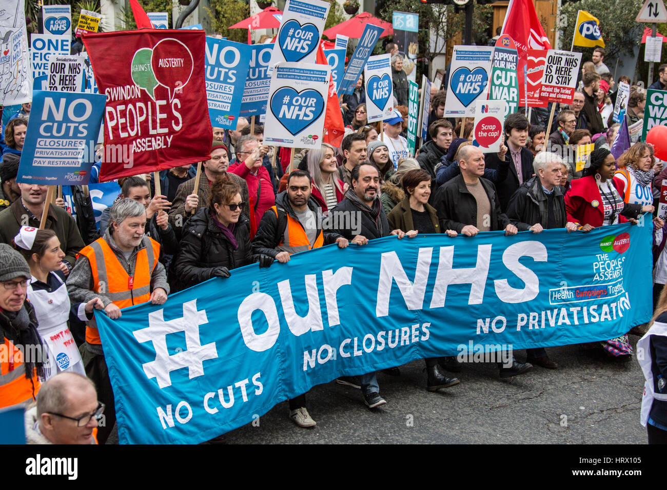 London, UK. 4 March, 2017. Our NHS, the lead banner as thousands march ...
