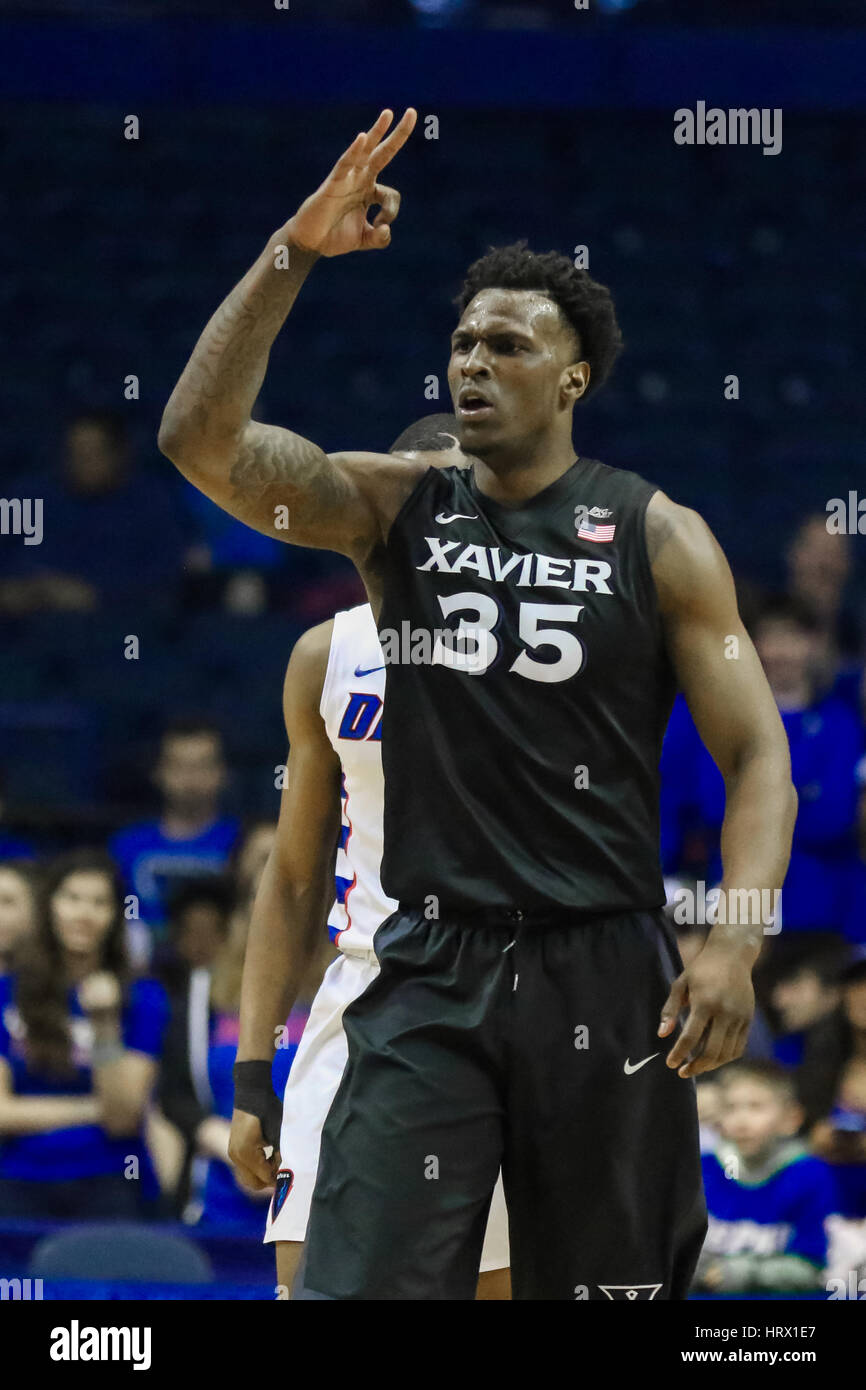 Saturday MAR 4 - Xavier Musketeers forward RaShid Gaston (35) holds up ...