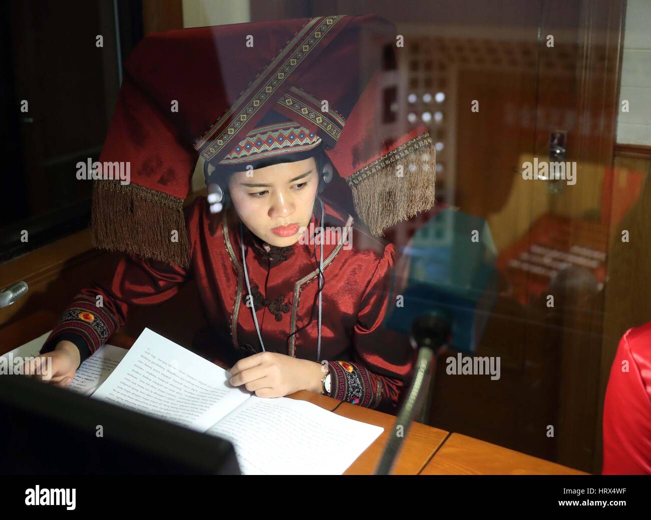 Beijing, China. 5th Mar, 2017. A female simultaneous interpreter works ...