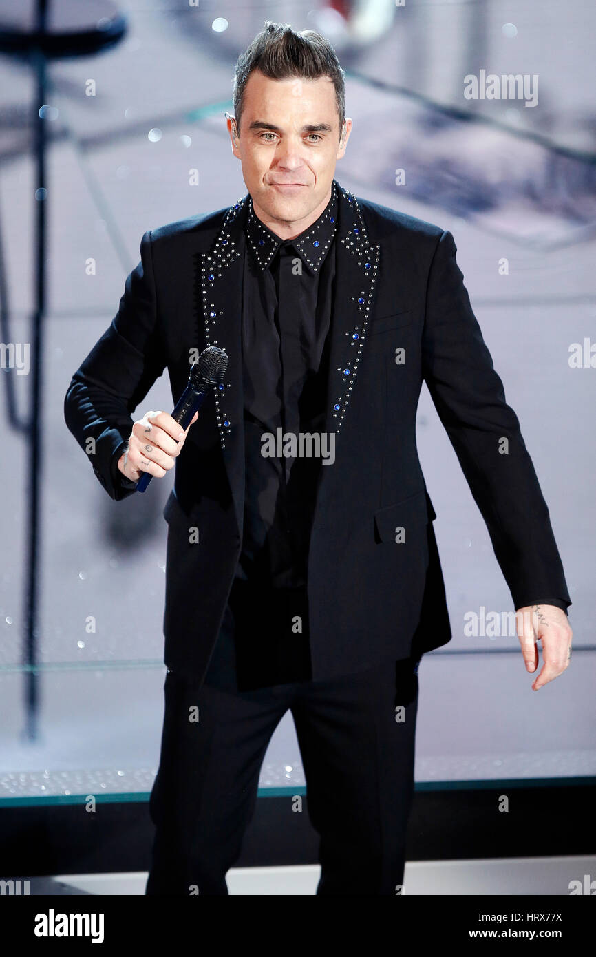 SANREMO, ITALY, February 8: Singer Robbie Williams performs during the ...