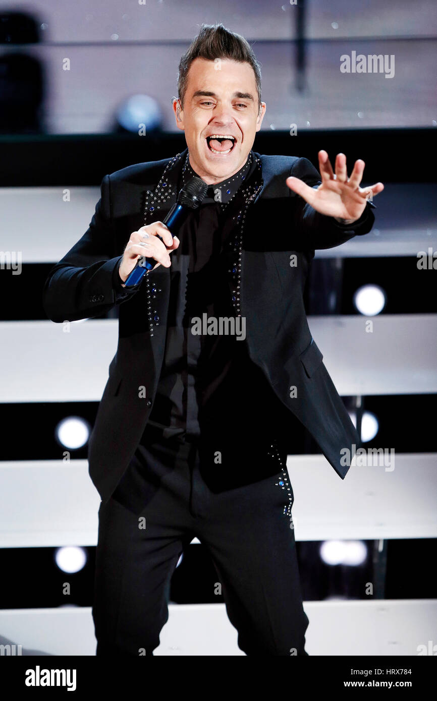 SANREMO, ITALY, February 8: Singer Robbie Williams performs during the ...