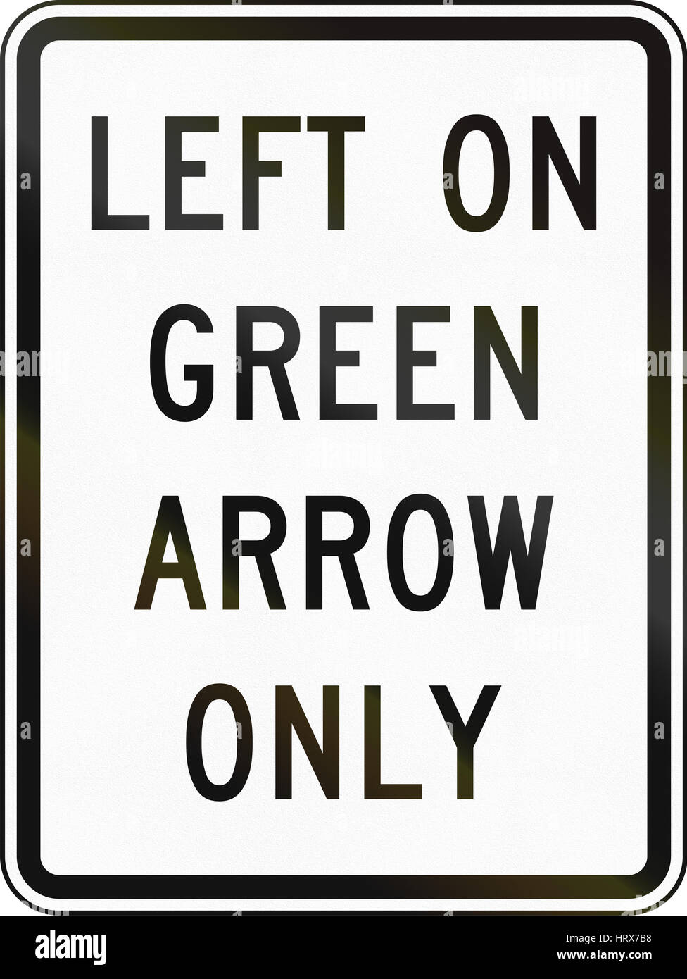 United States MUTCD regulatory road sign - Left on green only Stock ...