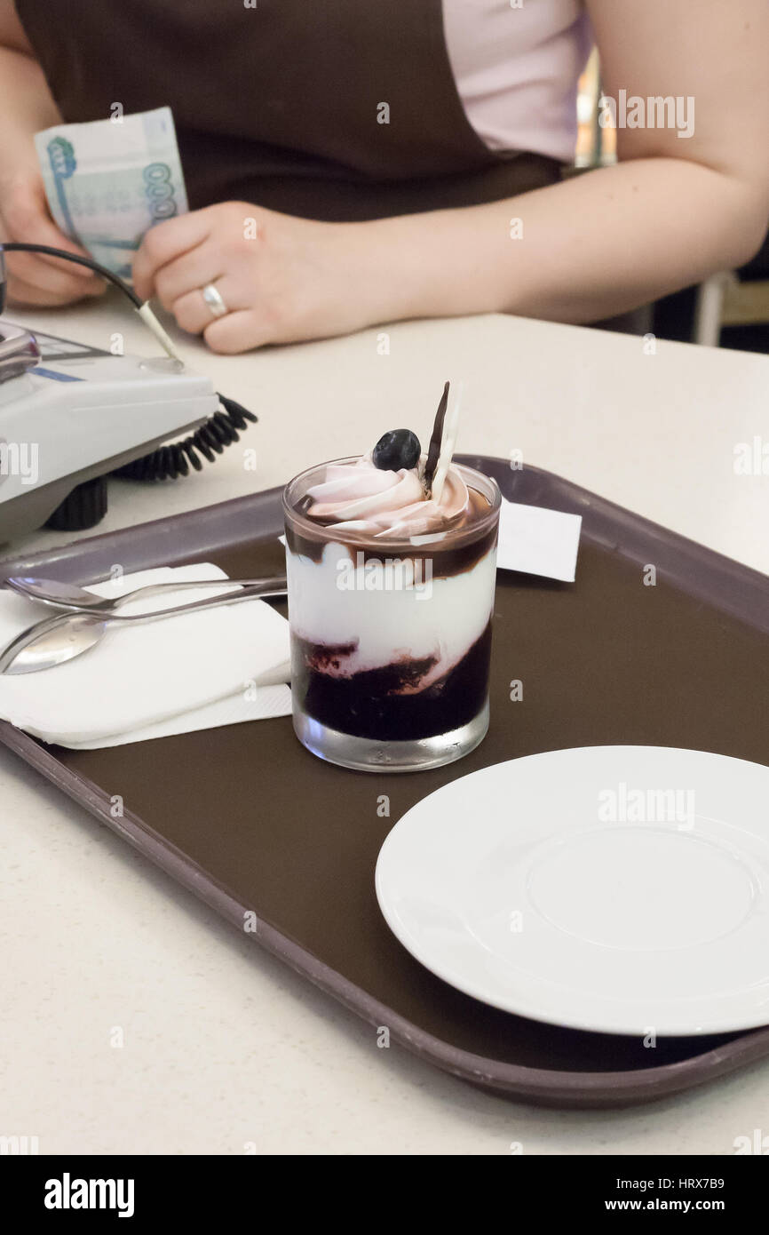 Paying for coffee in cafe Stock Photo - Alamy
