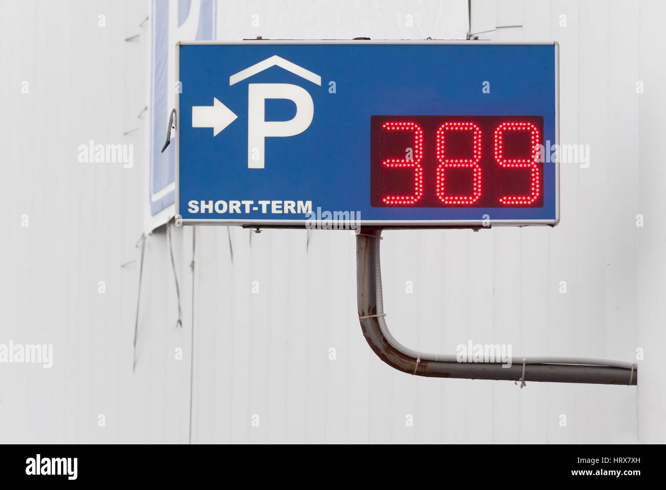 sign of the covered parking with number of empty seats Stock Photo - Alamy