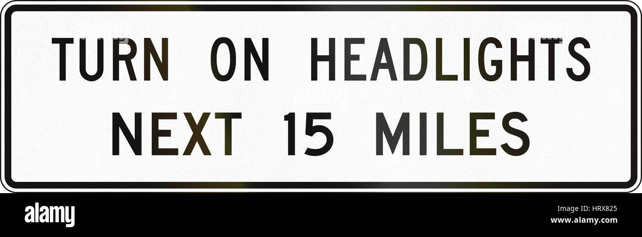 United States MUTCD road sign - Turn on headlights Stock Photo - Alamy