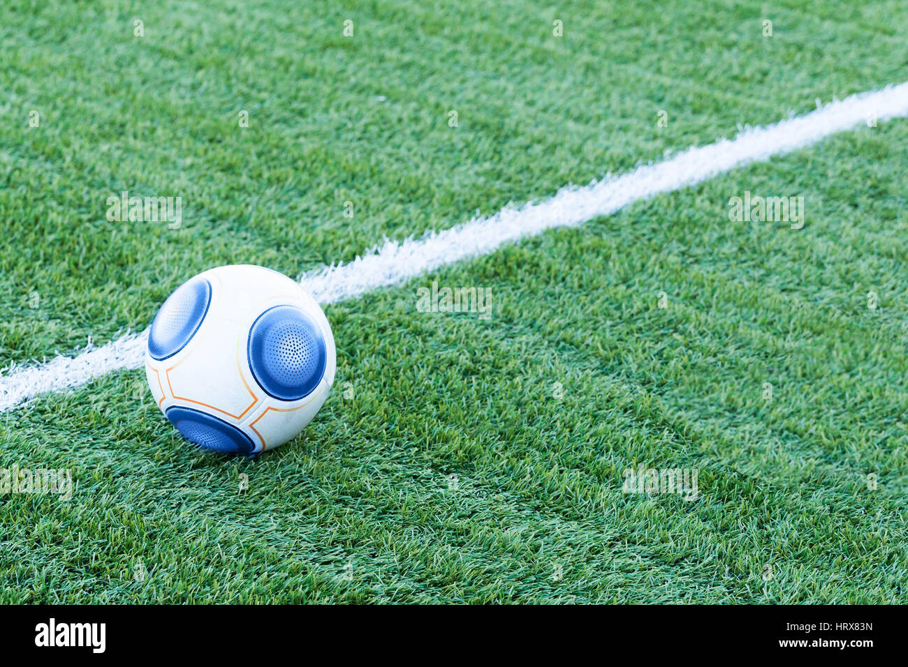traditional soccer ball on soccer field in summer day Stock Photo - Alamy