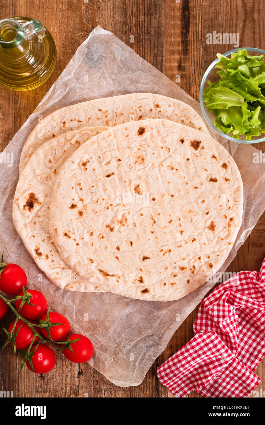 Piadina with ham and lettuce Stock Photo - Alamy