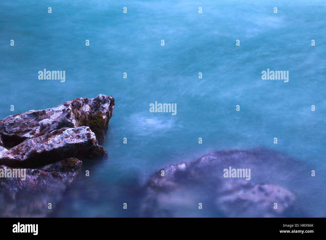 Fast flowing water in river rapids, long exposure Stock Photo - Alamy