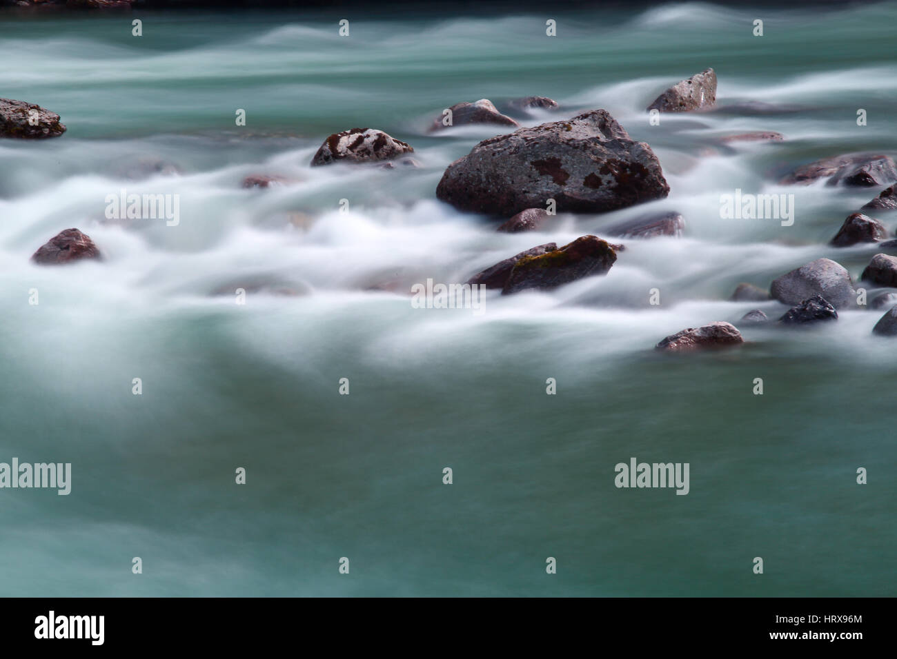 Fast flowing water in river rapids, long exposure Stock Photo - Alamy