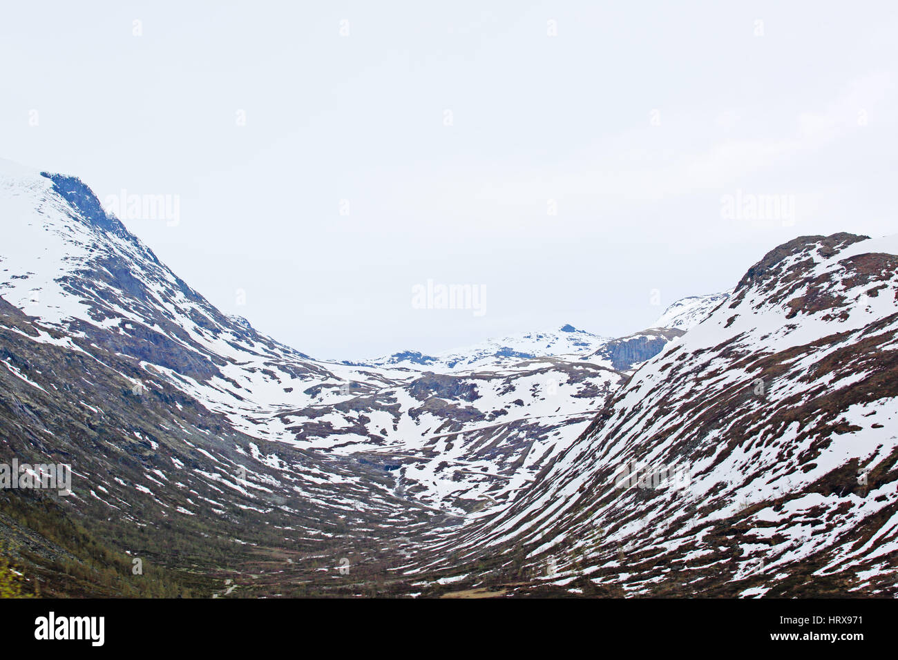 Beautiful spring Norway mountains with melting snow on tops Stock Photo ...