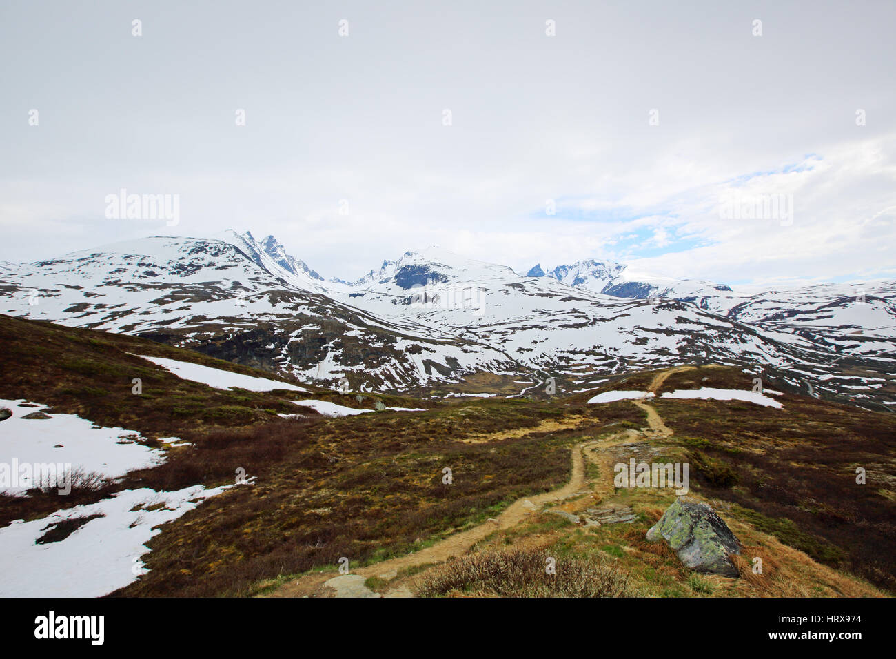 Beautiful spring Norway mountains with melting snow on tops Stock Photo ...