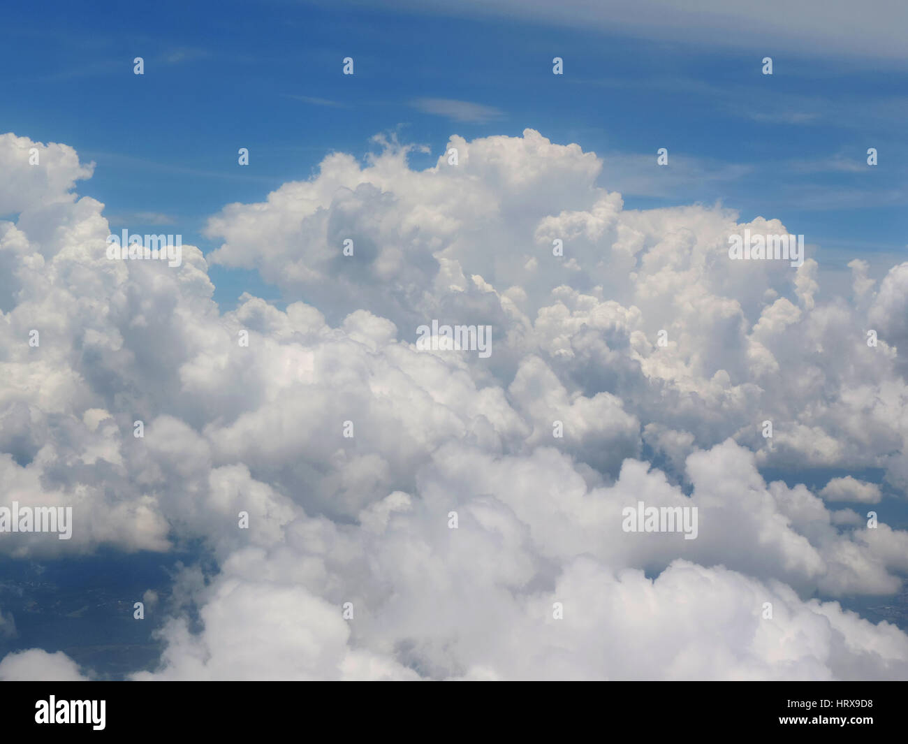 Big white clouds in the blue sky Stock Photo - Alamy