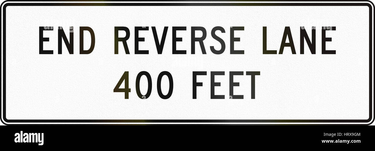 United States MUTCD regulatory road sign - End reverse lane Stock Photo ...