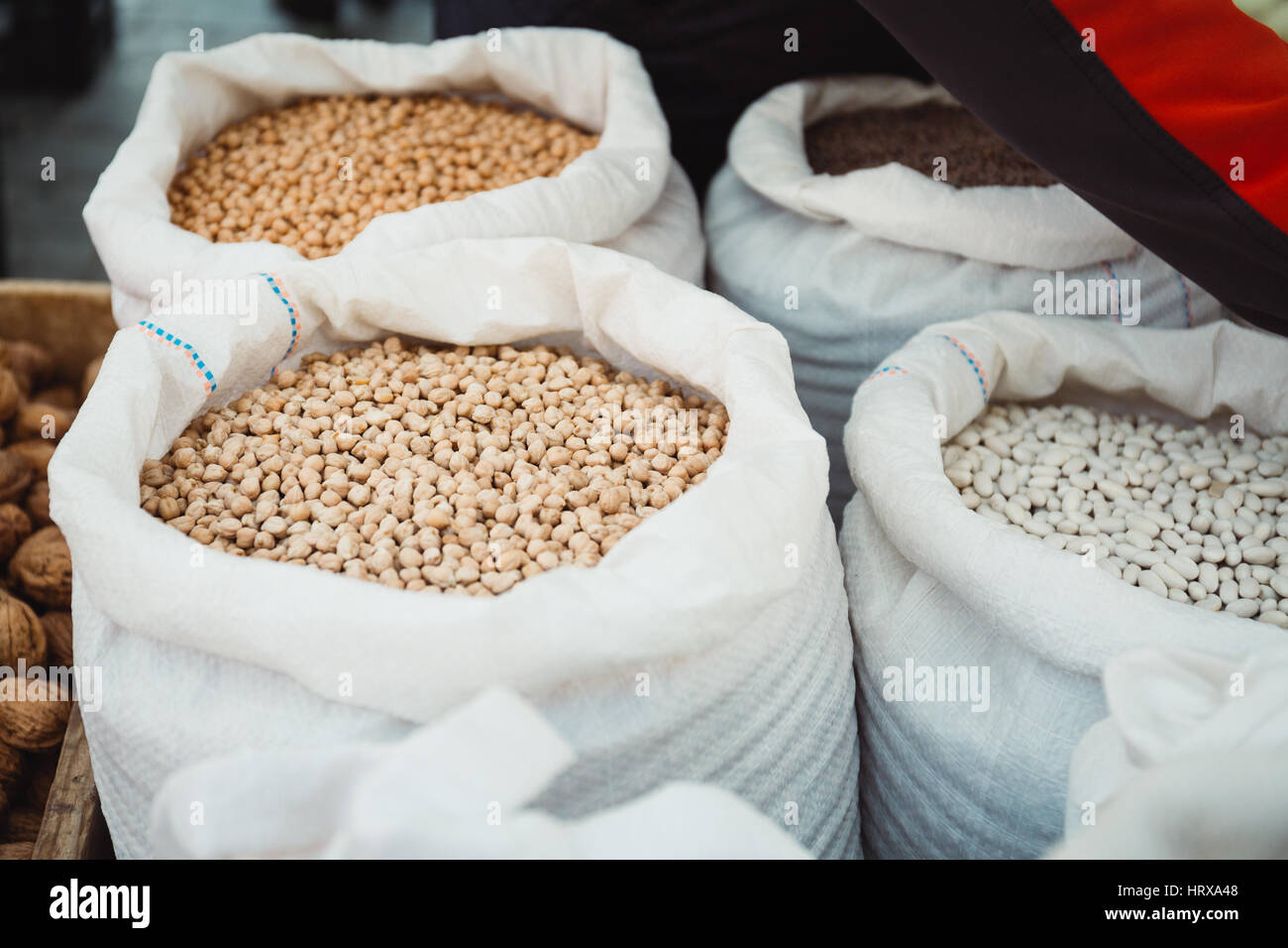 Sacks of beans and chick peas in a market stall at the traditional food ...