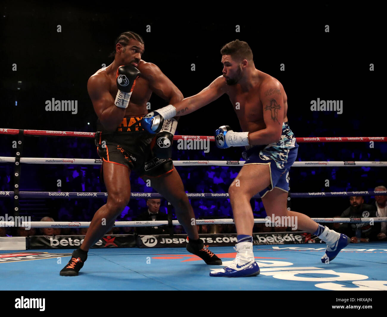 David Haye (left) takes on Tony Bellew during the heavyweight contest ...
