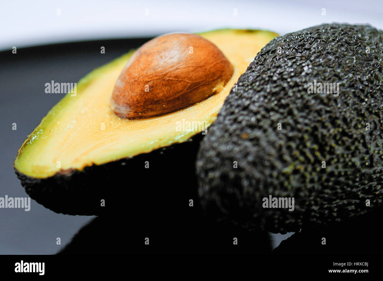 Sliced Avocado - very healthy fruit - close up shot Stock Photo - Alamy