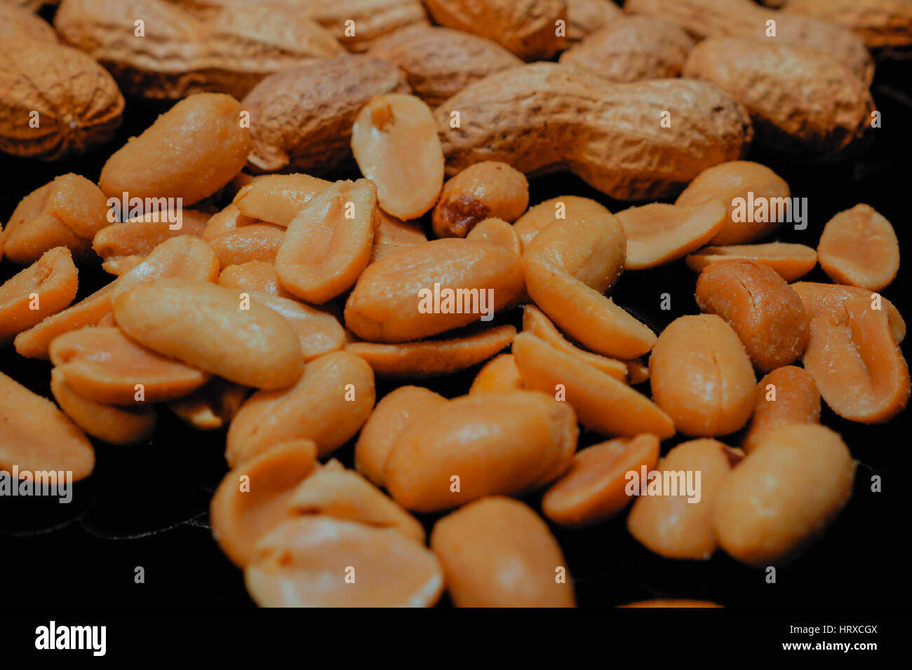 Roasted Peanuts - amazing macro shot Stock Photo - Alamy