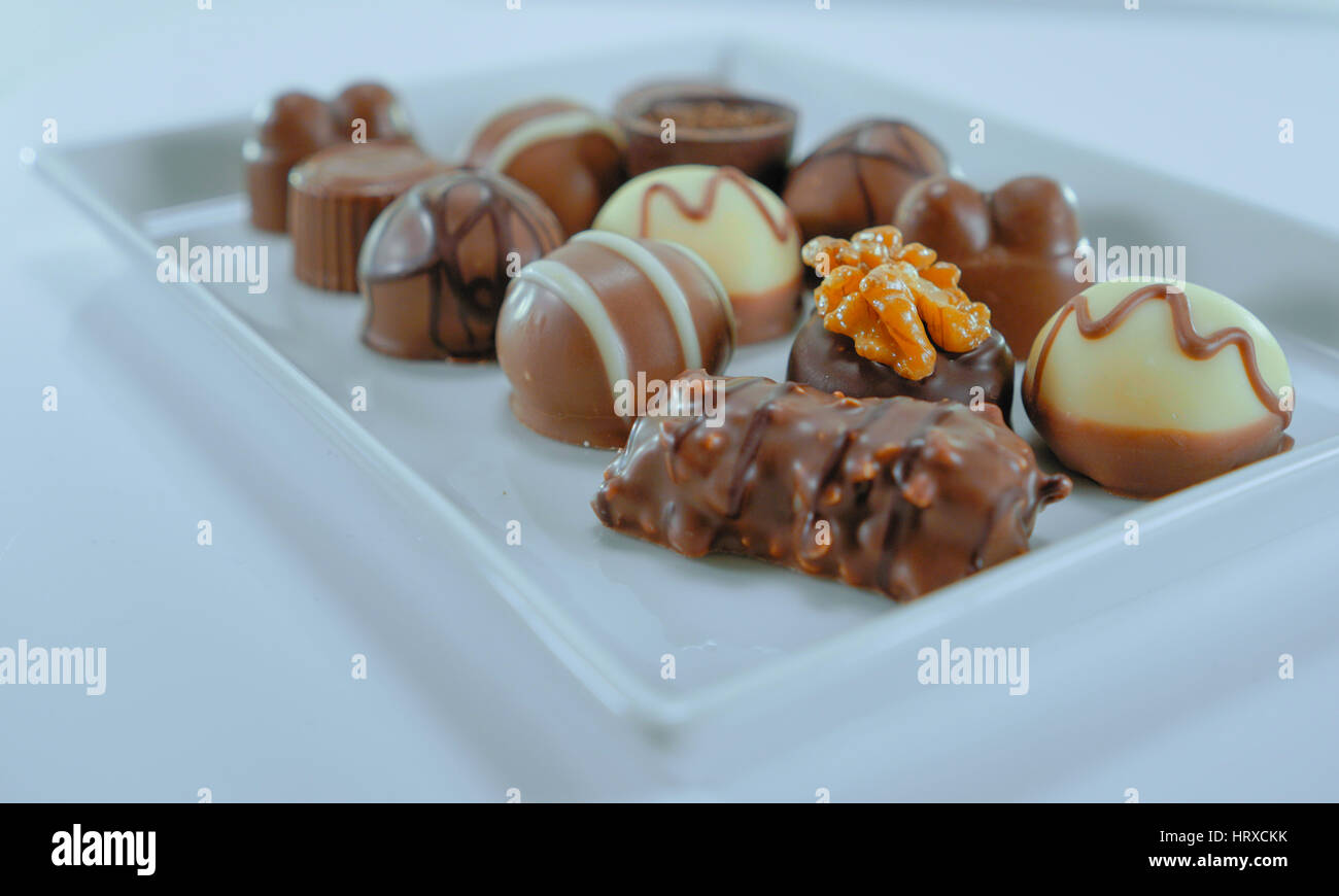 Pralines and chocolates - a variety of sweets Stock Photo - Alamy