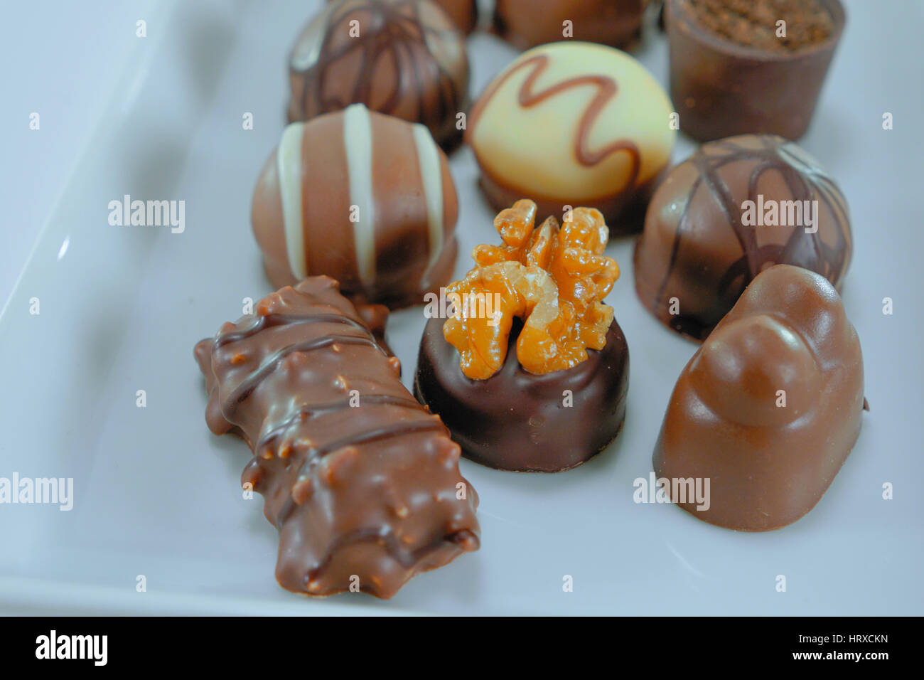 Pralines and chocolates - a variety of sweets Stock Photo - Alamy
