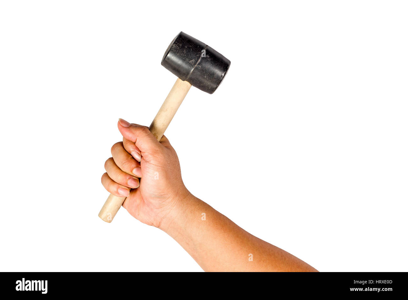Hand holding a rubber hammer on a white background. View from the side ...