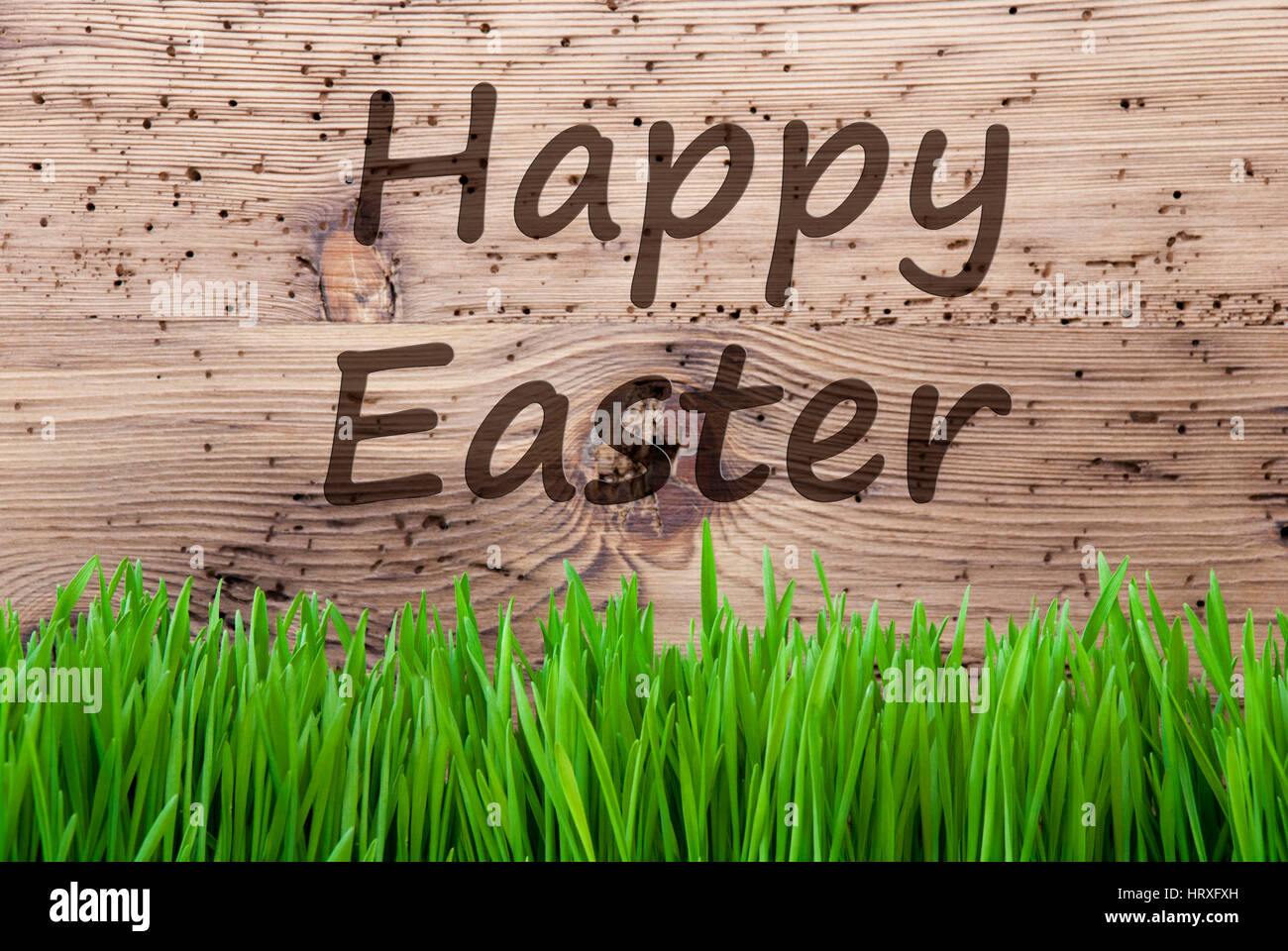 English Text Happy Easter. Spring Season Greeting Card. Bright Aged Wooden Background With Gras ...