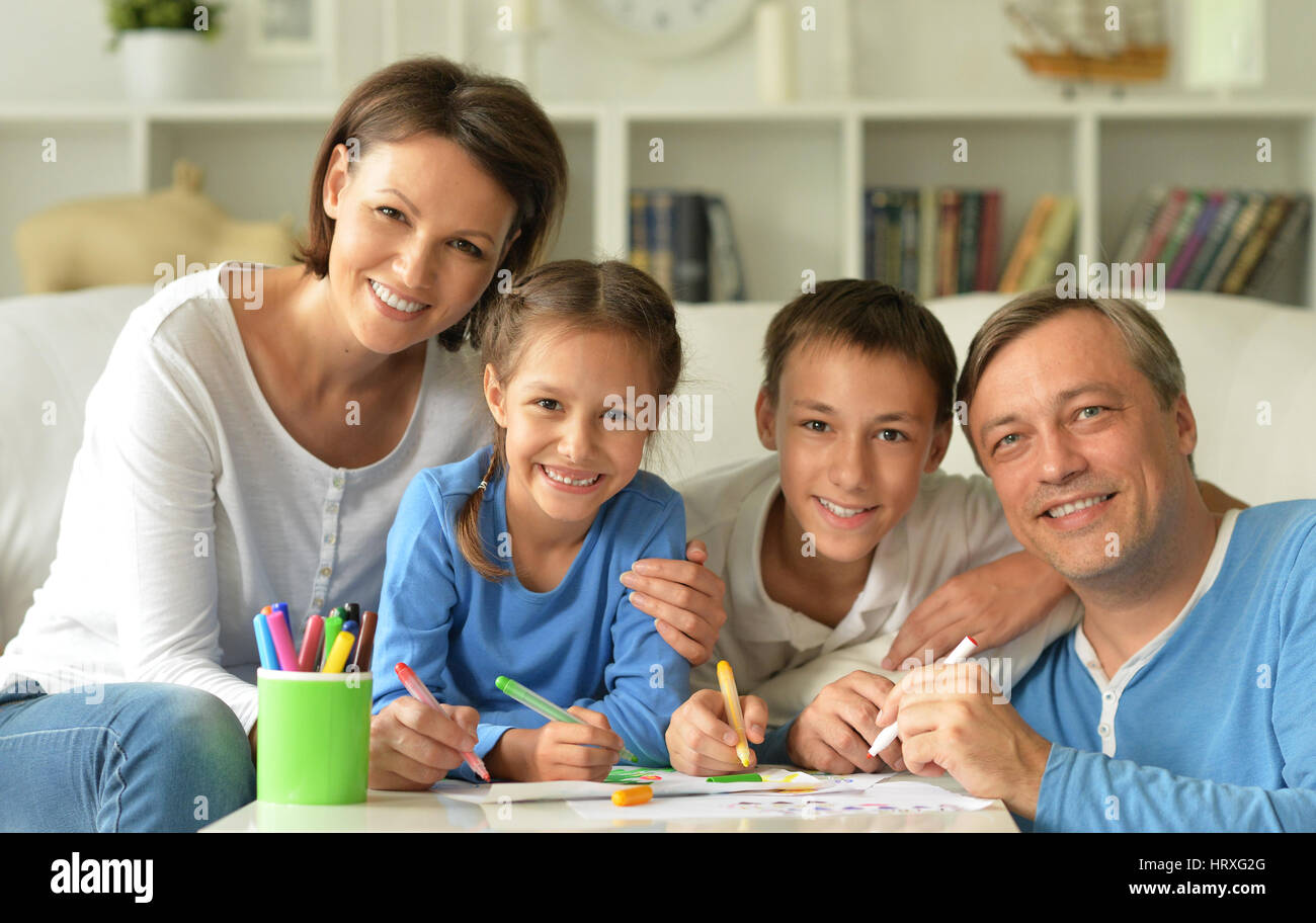 Big happy family drawing together hi-res stock photography and images ...