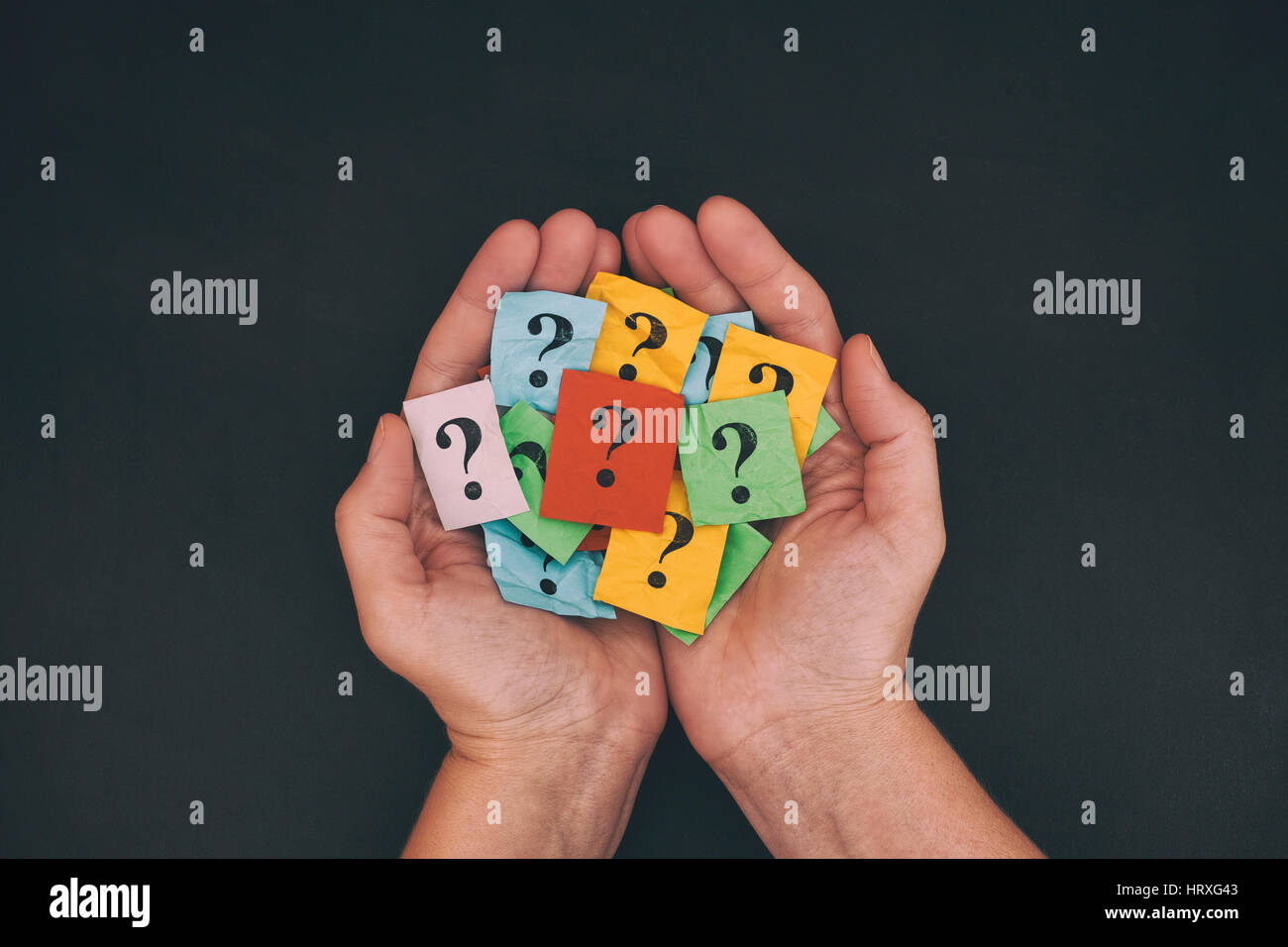 Too Many Questions. Pile of colorful paper notes with question marks in ...