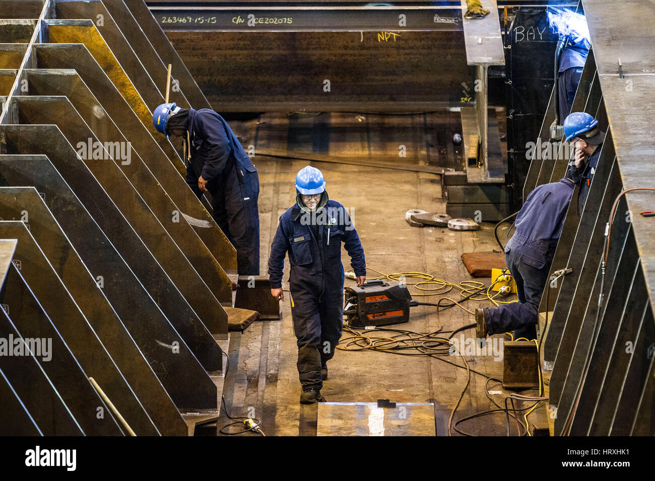 Welders working in heavy industry Stock Photo - Alamy