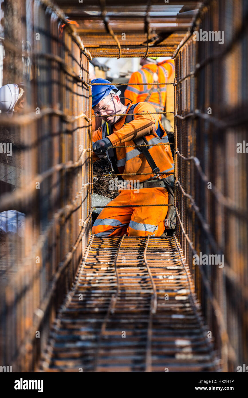 Rail construction workers laying foundations for the Aberdeen to ...