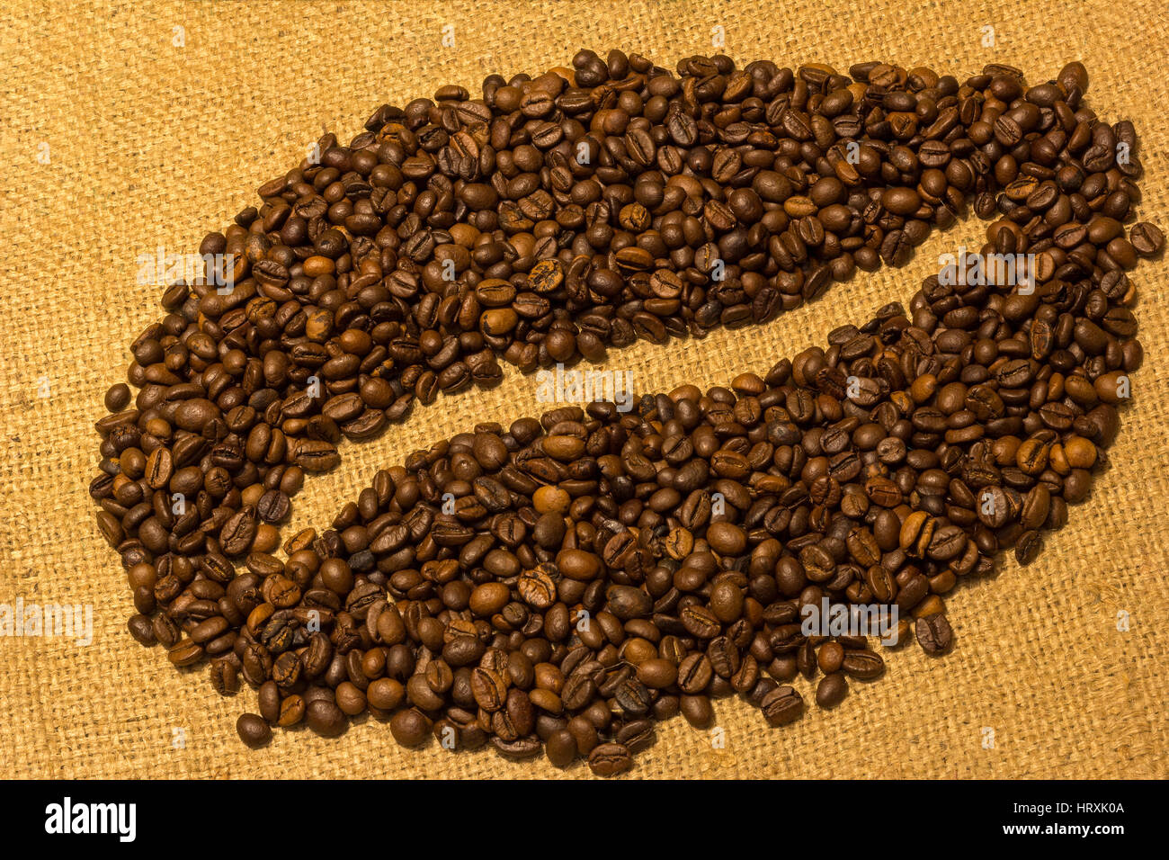 one big abstract coffee bean made of many real coffee beans Stock Photo ...