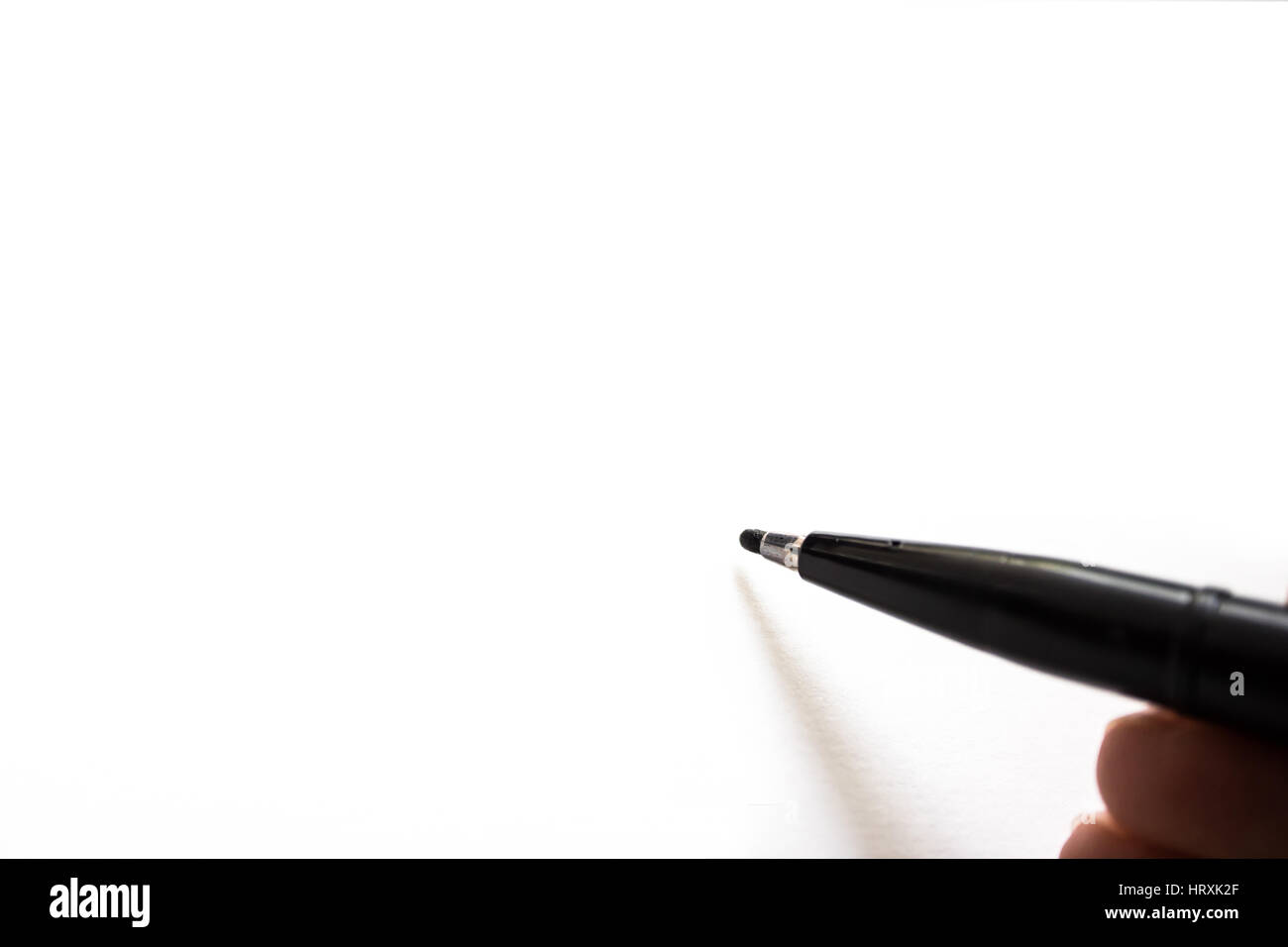 Pencil writing mark on white paper. Blurry focus Stock Photo - Alamy