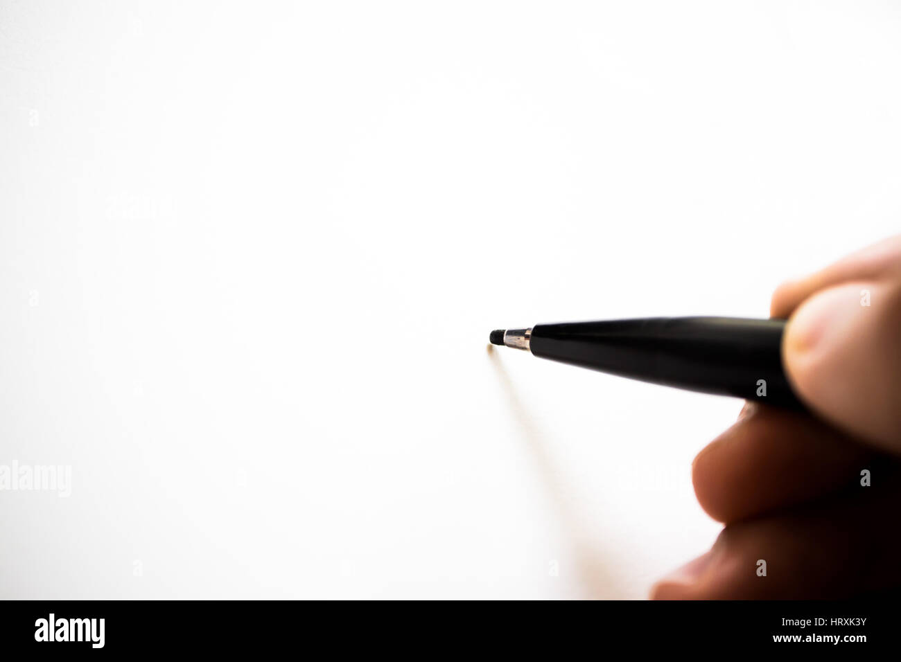 Pencil writing mark on white paper. Blurry focus Stock Photo - Alamy
