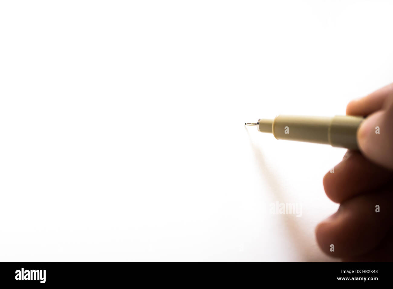 Pencil writing mark on white paper. Blurry focus Stock Photo - Alamy
