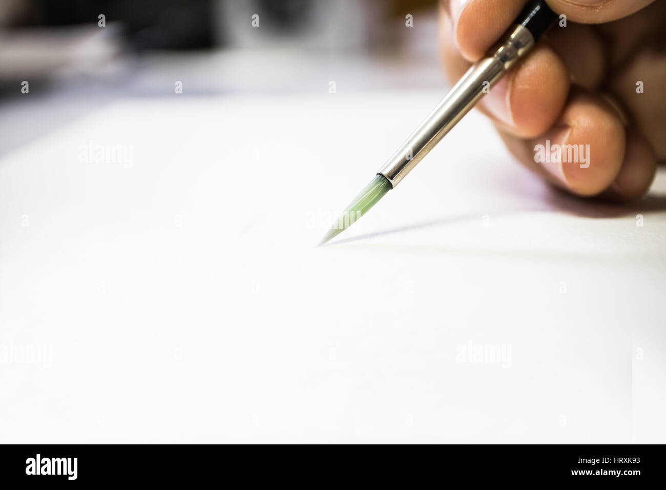 Hand holding pen closeup view Stock Photo - Alamy