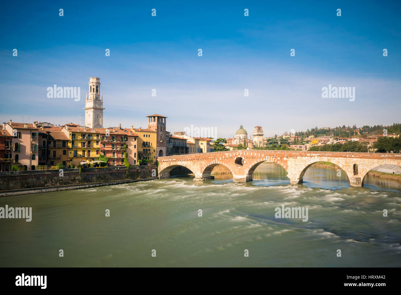 "Stone Bridge", the famous old bridge in Verona crosses the Adige river ...