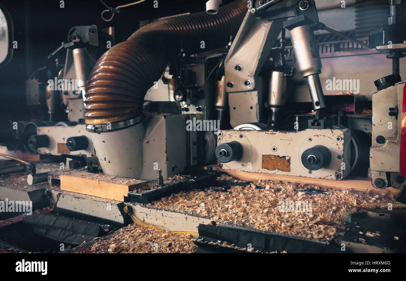 Detail of a machine for processing wood in a sawmill Stock Photo - Alamy