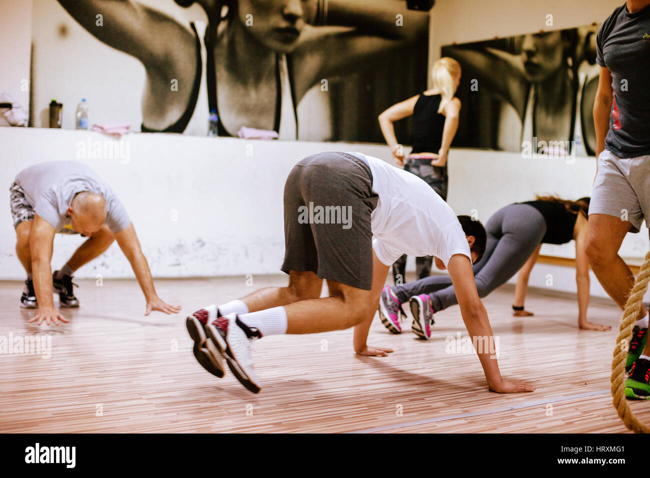 crossfit group training. Group training indoors Stock Photo - Alamy