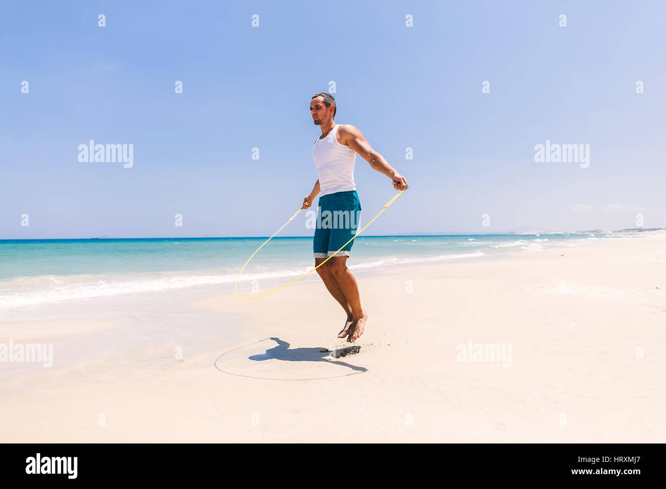 Man jumping rope and beach hi-res stock photography and images - Alamy