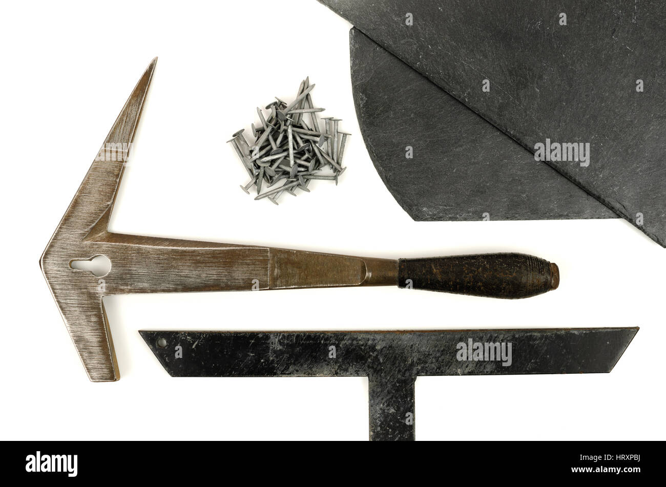 Tools for slater slate hammer on white background Stock Photo - Alamy