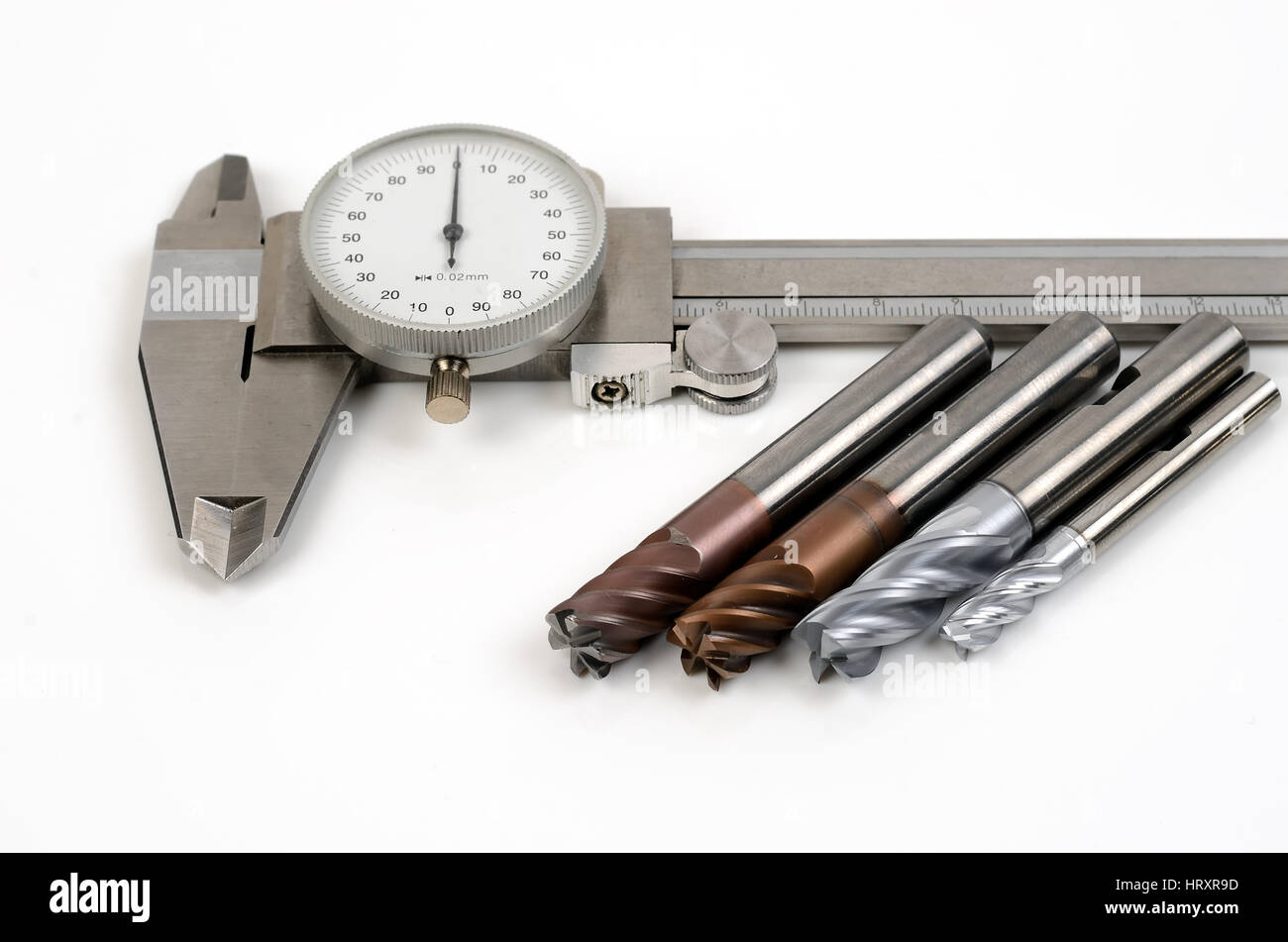 Metal milling tools for cnc machine on white background Stock Photo - Alamy